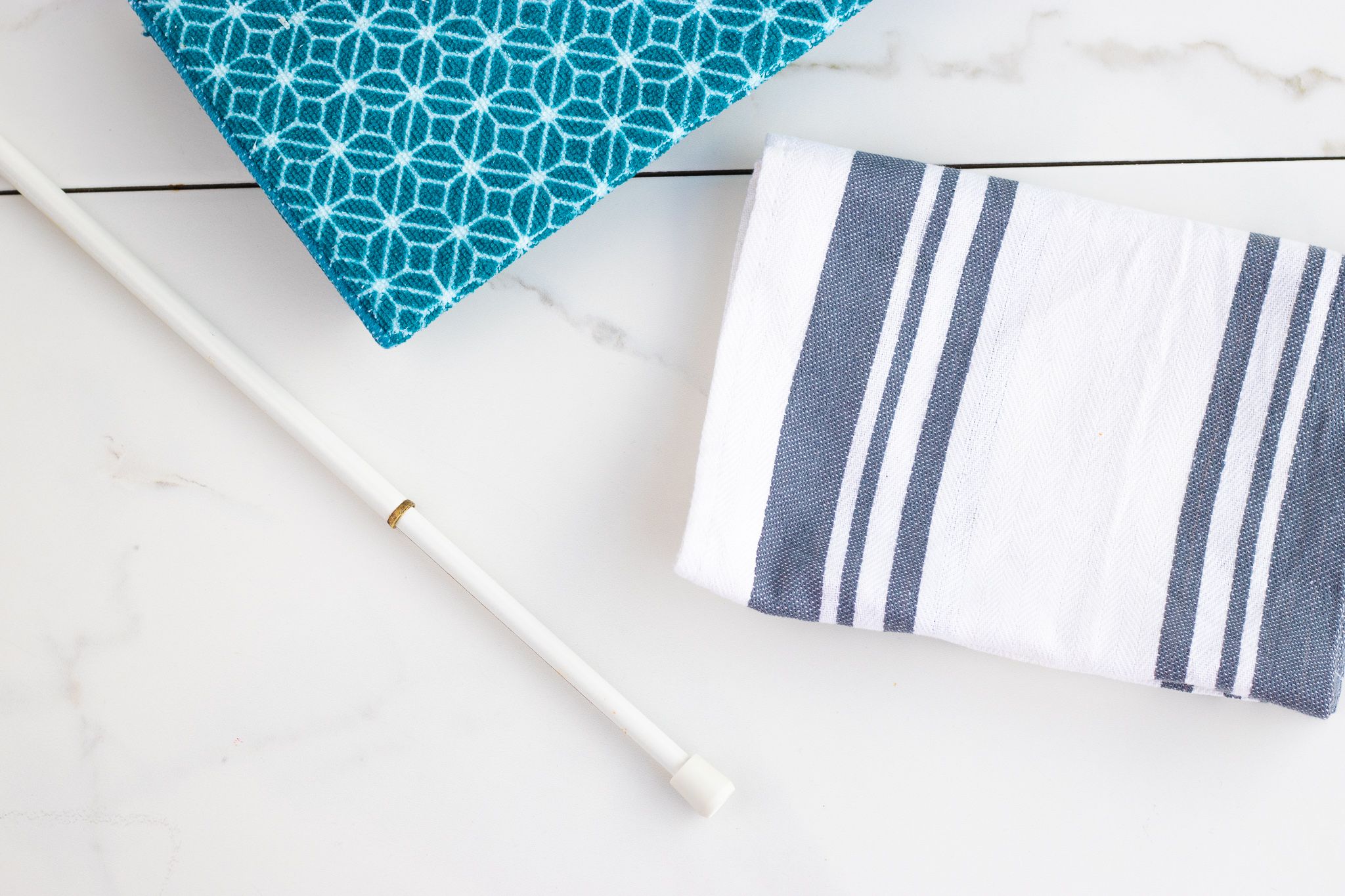 Easy DIY Kitchen Hack: Tension Rod Drying Rack - Forkly